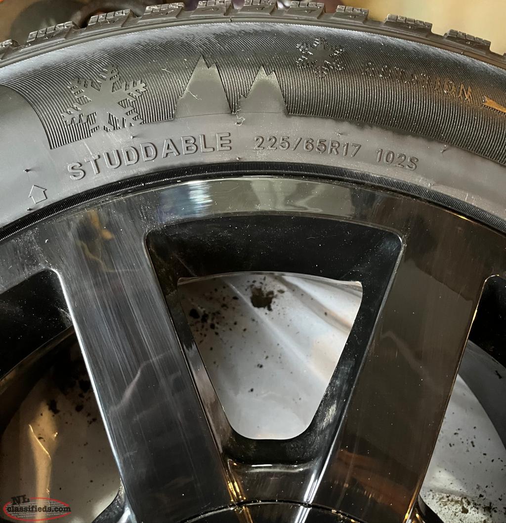 Studded tires on black Mazzi wheels - Badger's Quay, Newfoundland ...